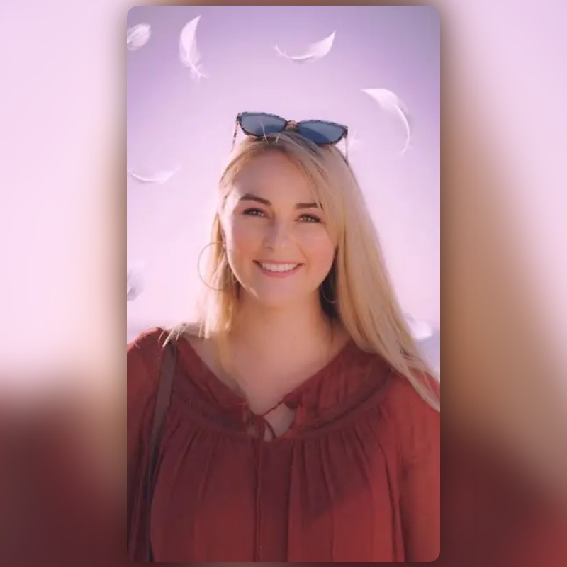 Falling Feathers Lens by Snapchat - Snapchat Lenses and Filters